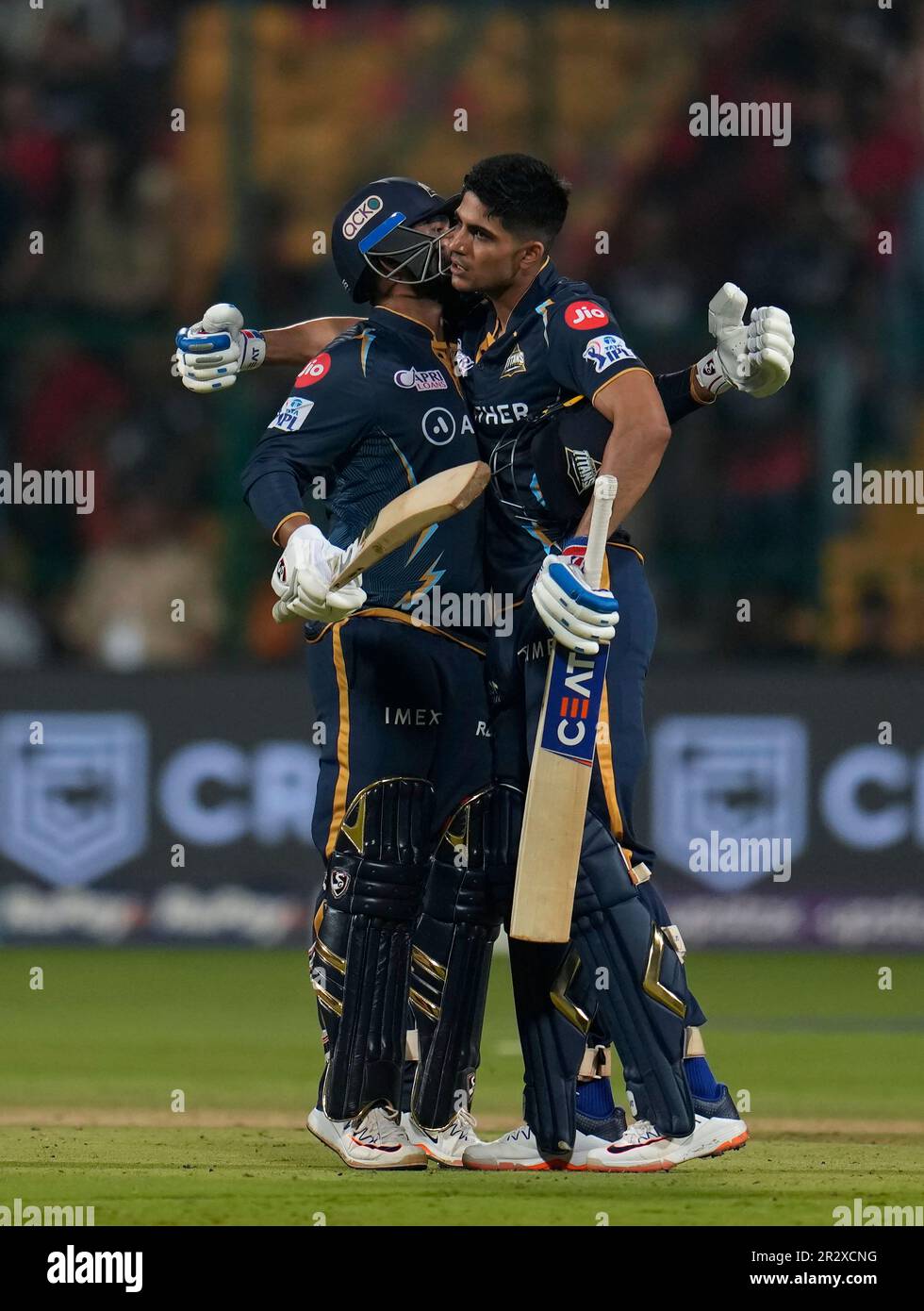 Gujarat Titans' Shubman Gill hugs teammate Rahul Tewatia after winning ...