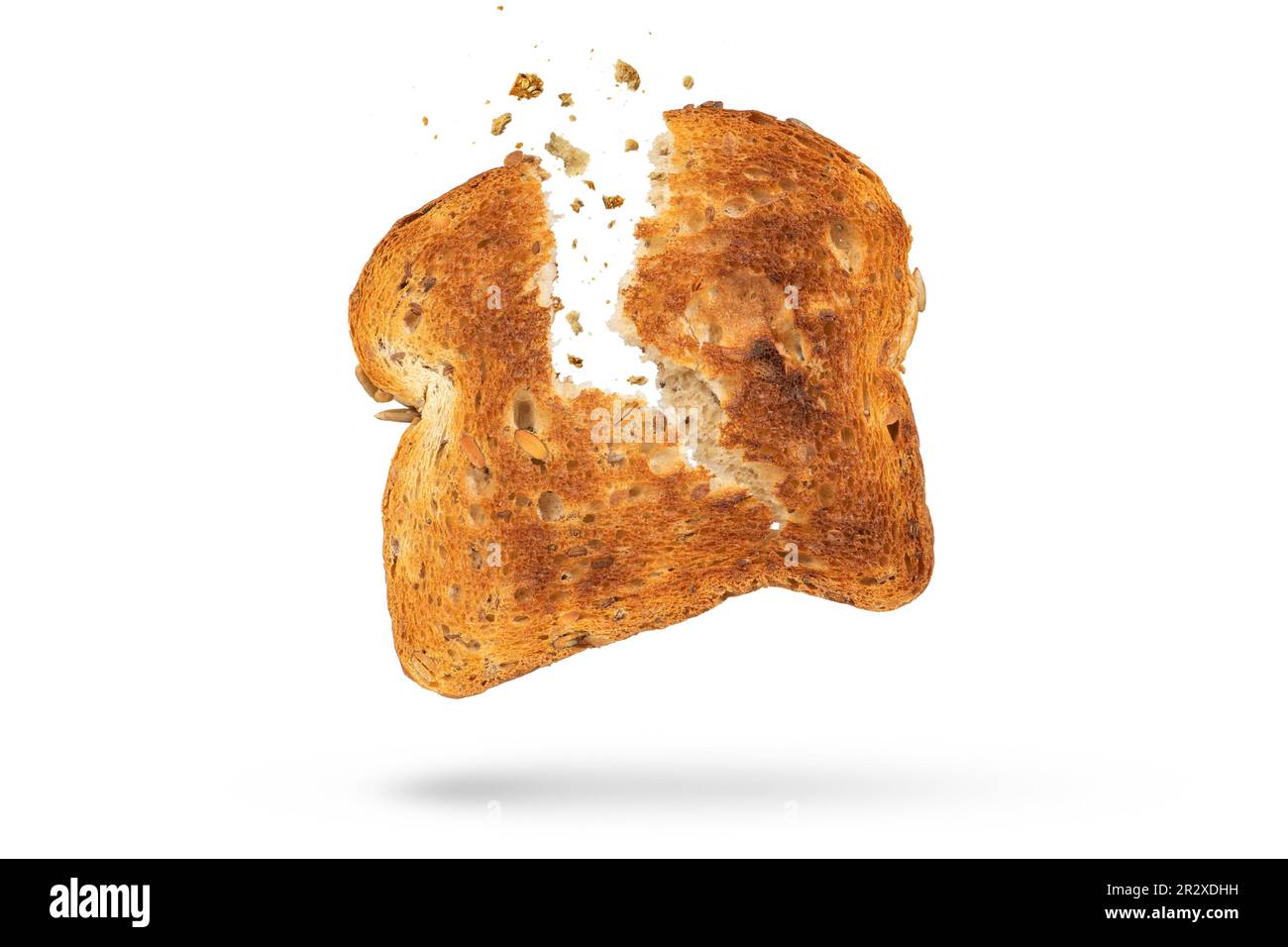 White bread slice isolate broken into 2 pieces with flying crumbs ...