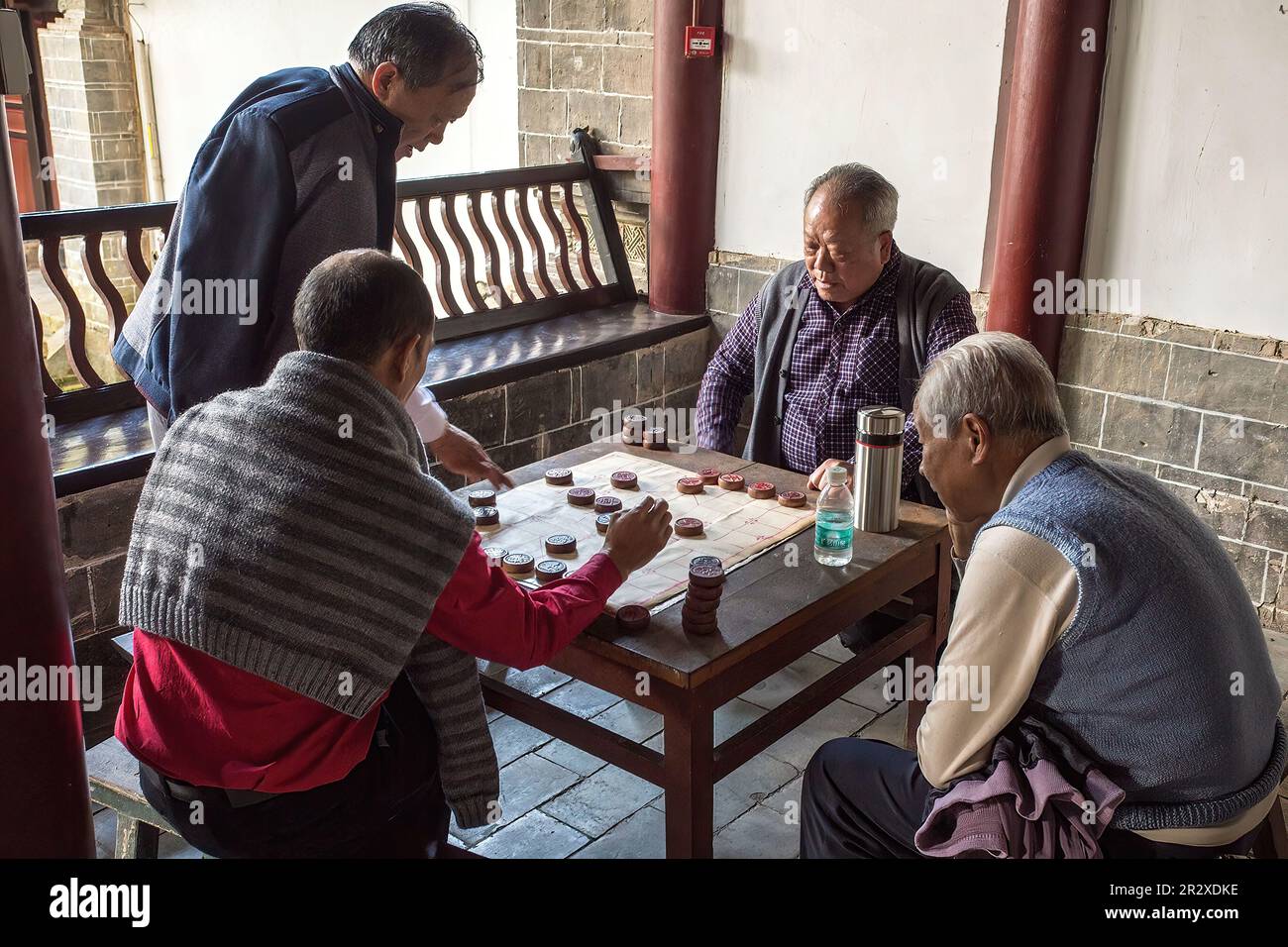 Playing games in temple hi-res stock photography and images - Alamy