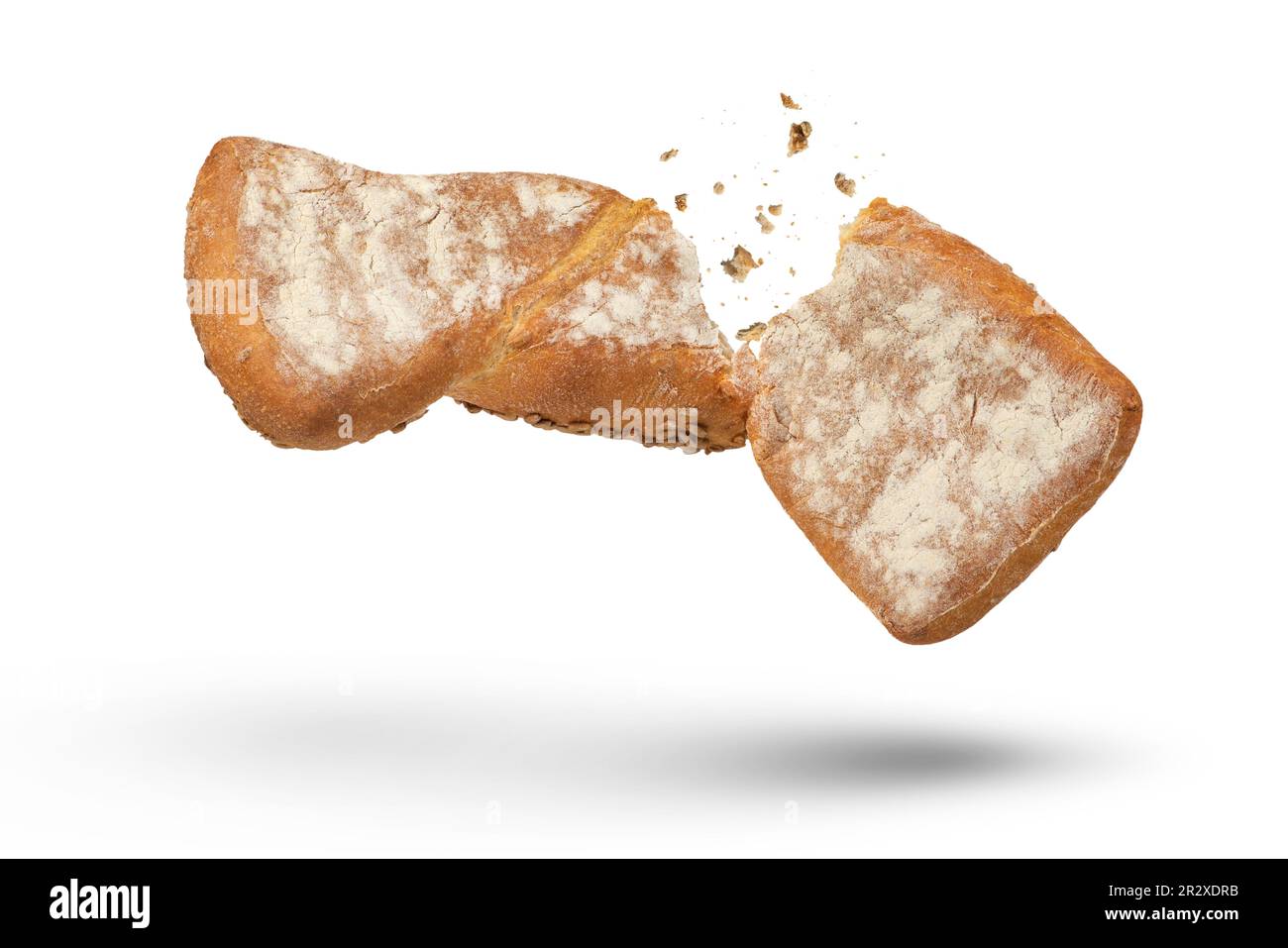 Loaf of crispy bread isolated on white. A loaf of freshly baked crispy ...