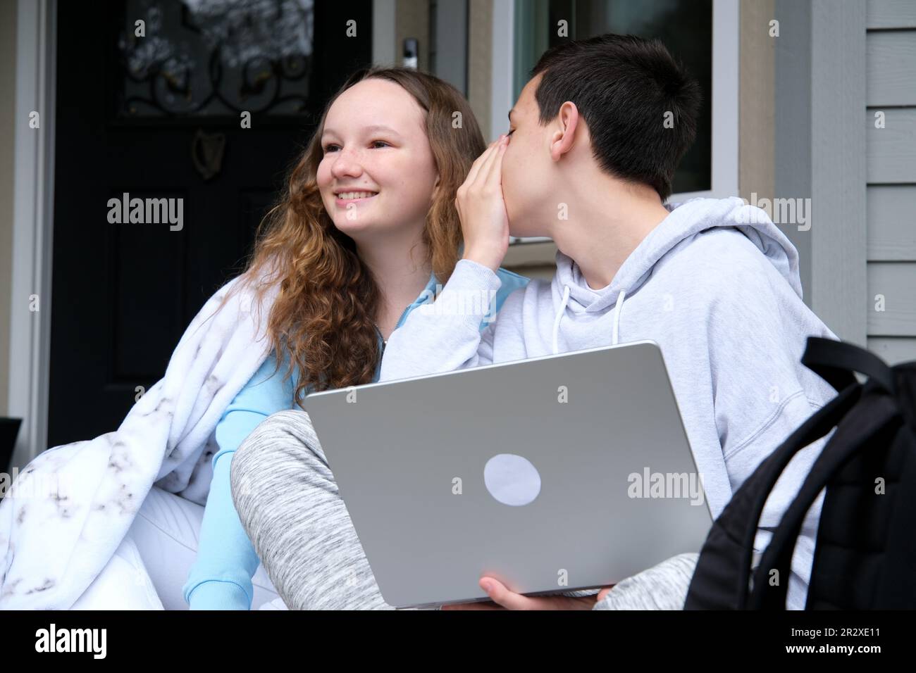 pleasant relationship teenagers boy and girl doing lessons together on ...