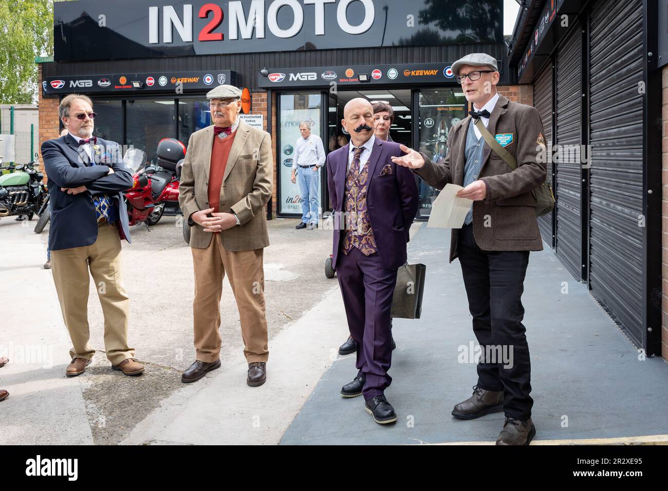 Group motorcyclists riding through hi-res stock photography and images ...