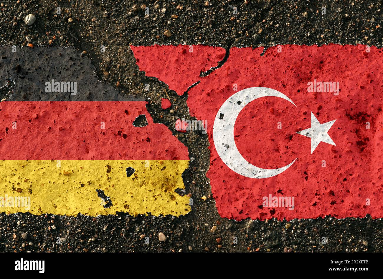 On the pavement are images of the flags of Germany and Turkey, as a ...