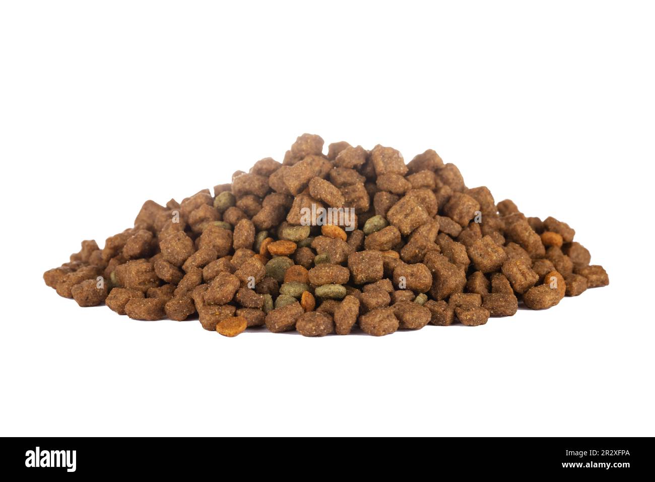 Brown crunchy organic kibble pieces for dog feed heap isolated on white ...