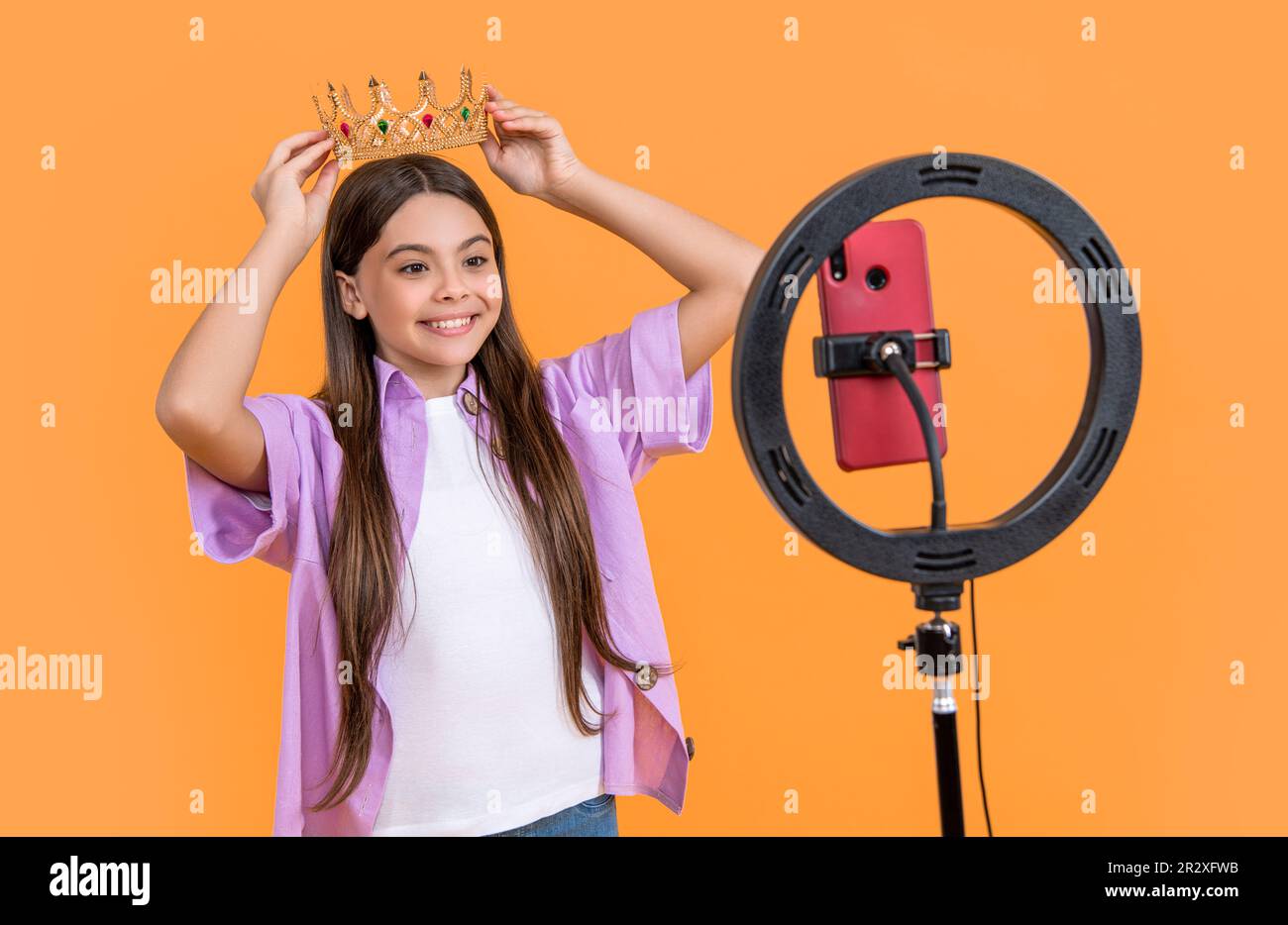 photo of positive teen blogger girl with crown. teen blogger girl with ...