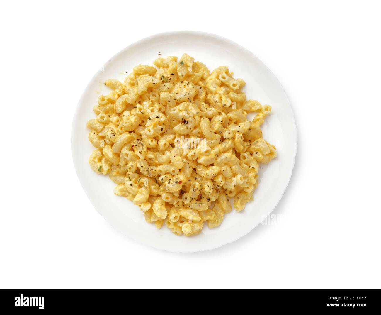 Plate of tasty Italian pasta with Cheddar cheese on white background ...
