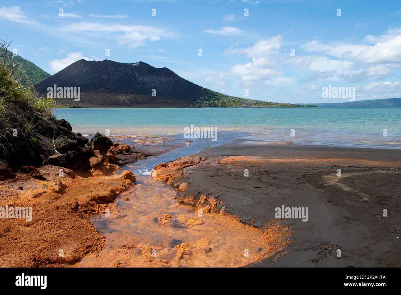 Papua New Guinea, New Britain Island, Rabaul. Black sand beach and hot ...
