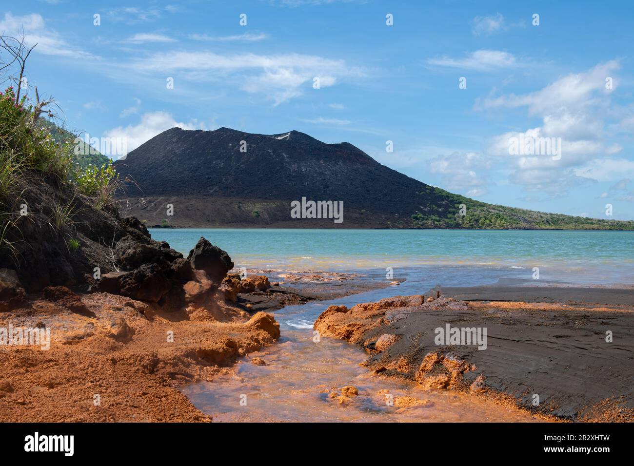 Papua New Guinea, New Britain Island, Rabaul. Black sand beach and hot ...