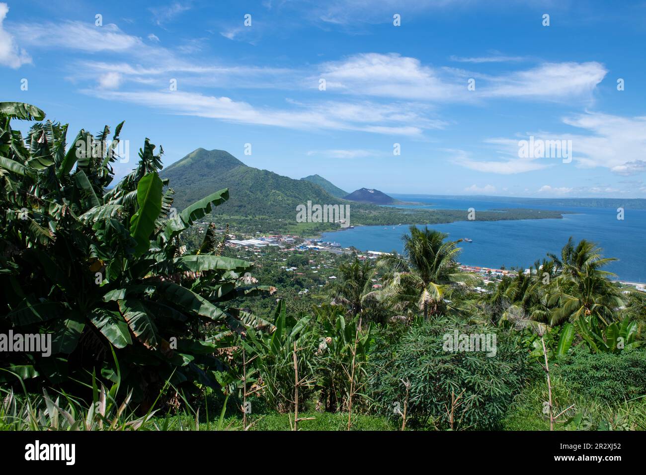 Papua New Guinea, New Britain Island, Rabaul. Harbor and volcano view ...
