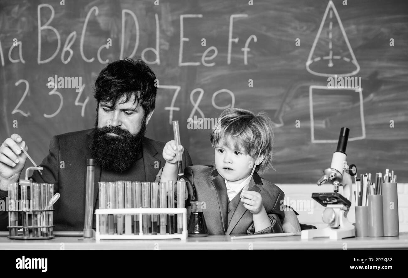 Educational school program. Schoolboy cute child experimenting with ...