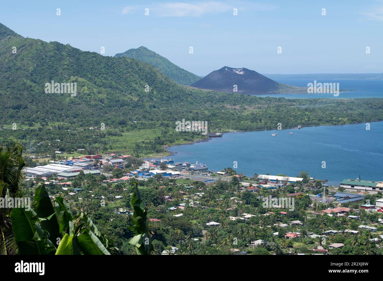 Papua New Guinea, New Britain Island, Rabaul. Harbor and volcano view ...