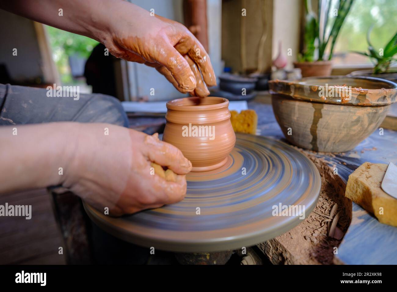 ceramics, workshop, ceramic art concept - close-up of man's hands ...