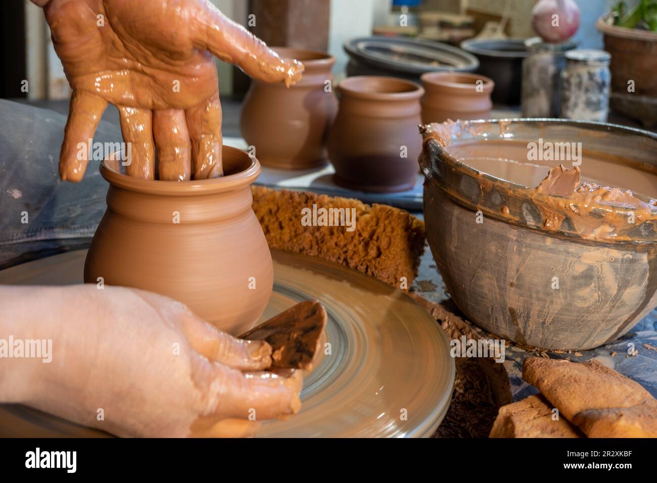 ceramics, workshop, ceramic art concept - close-up of man's hands ...
