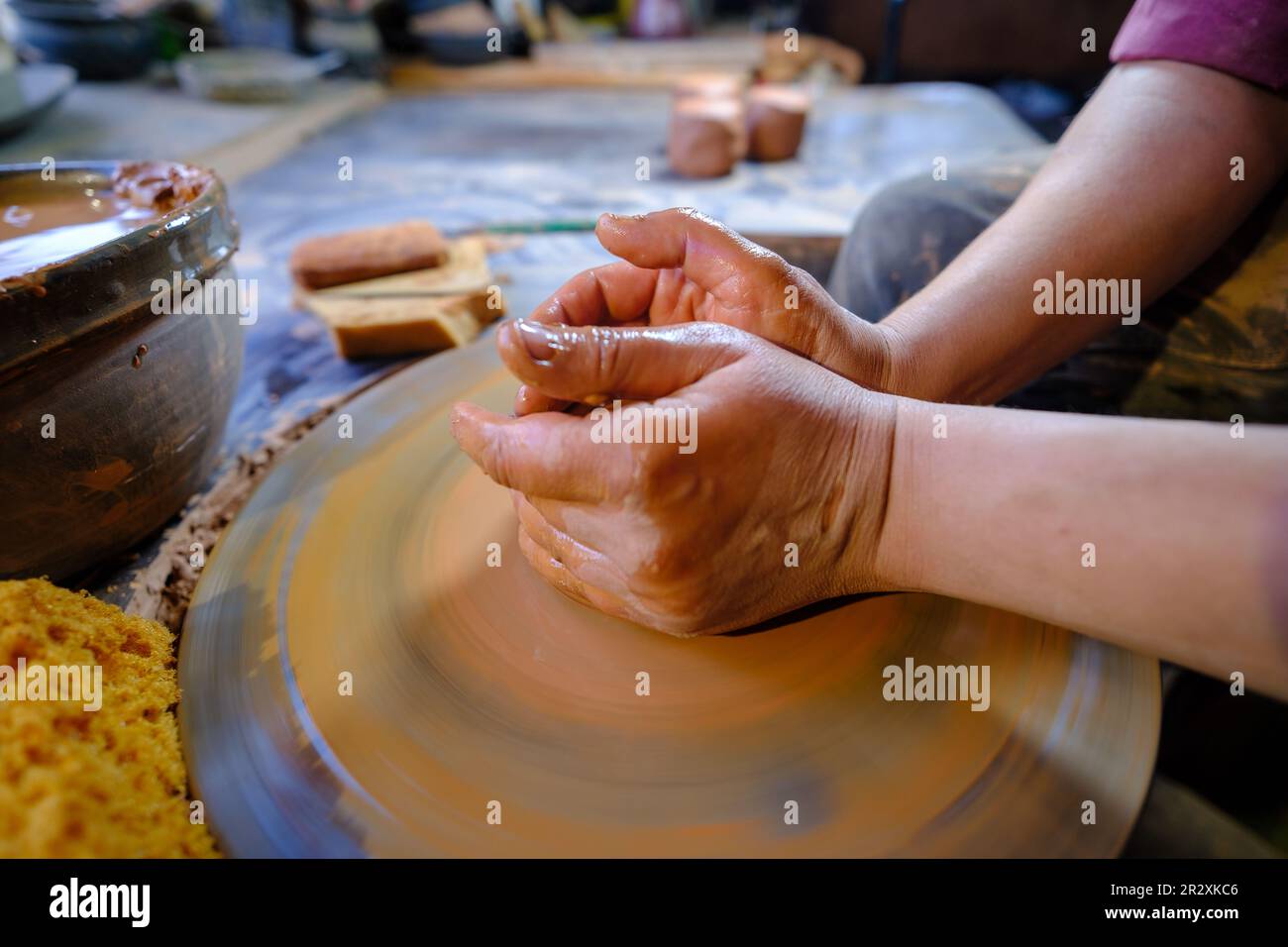 ceramics, workshop, ceramic art concept - close-up of man's hands ...