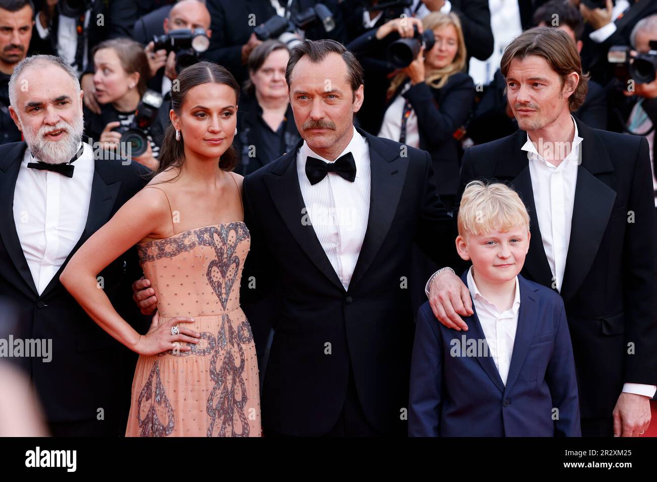 Cannes, France. 21st May, 2023. Karim Ainouz, Alicia Vikander, Jude Law ...