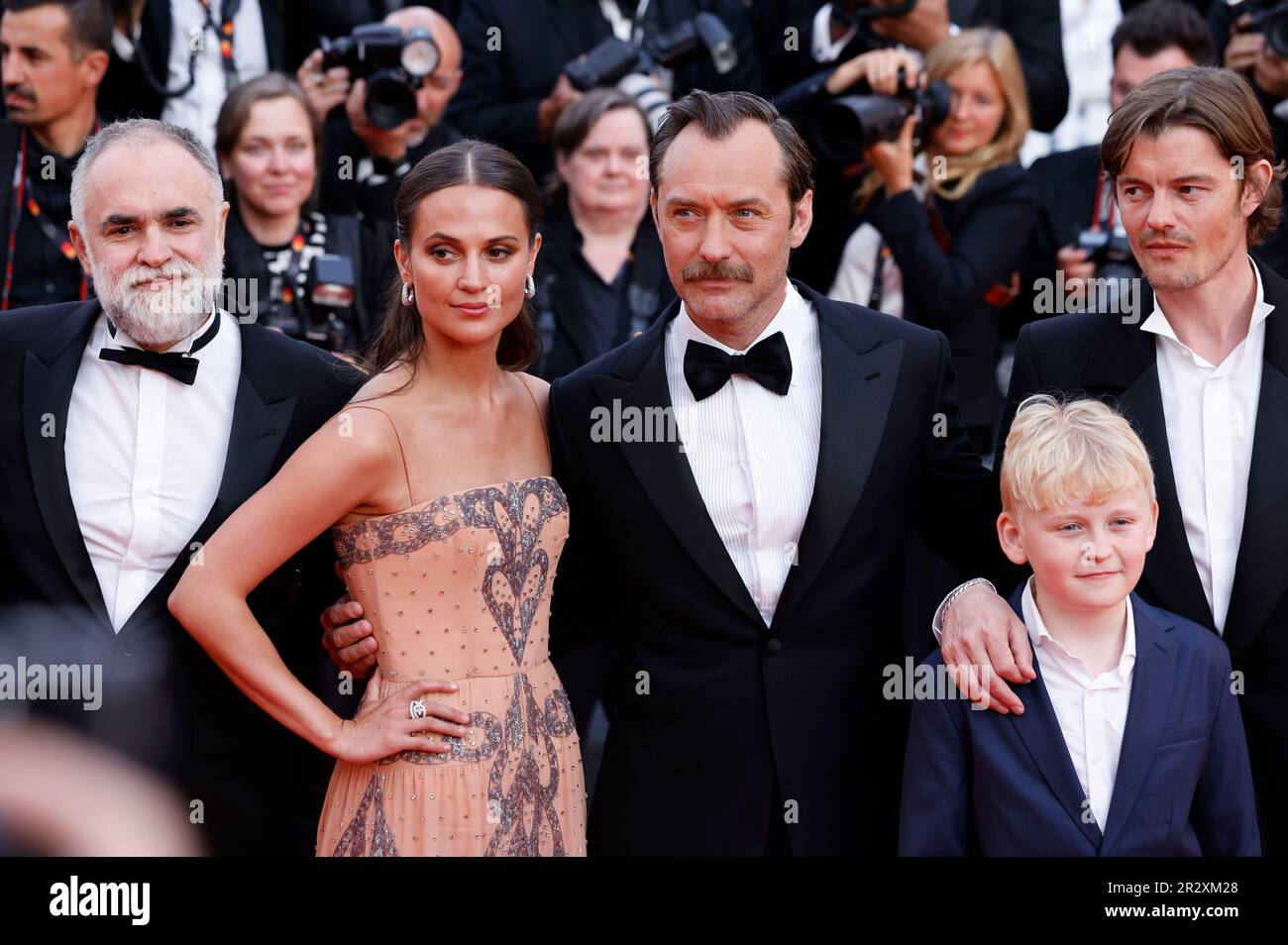 Cannes, France. 21st May, 2023. Karim Ainouz, Alicia Vikander, Jude Law ...