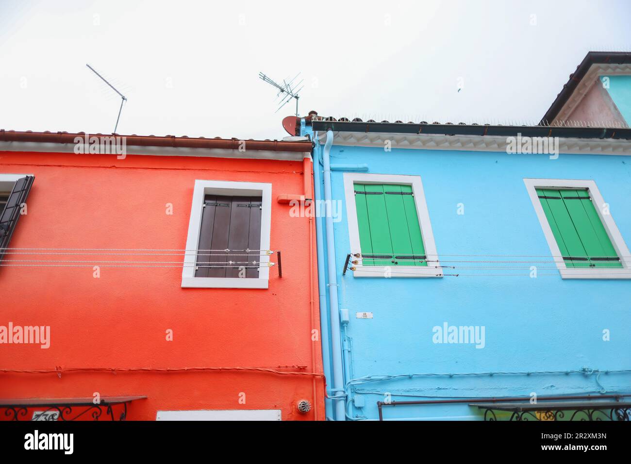 blue and orange wall of house Stock Photo - Alamy