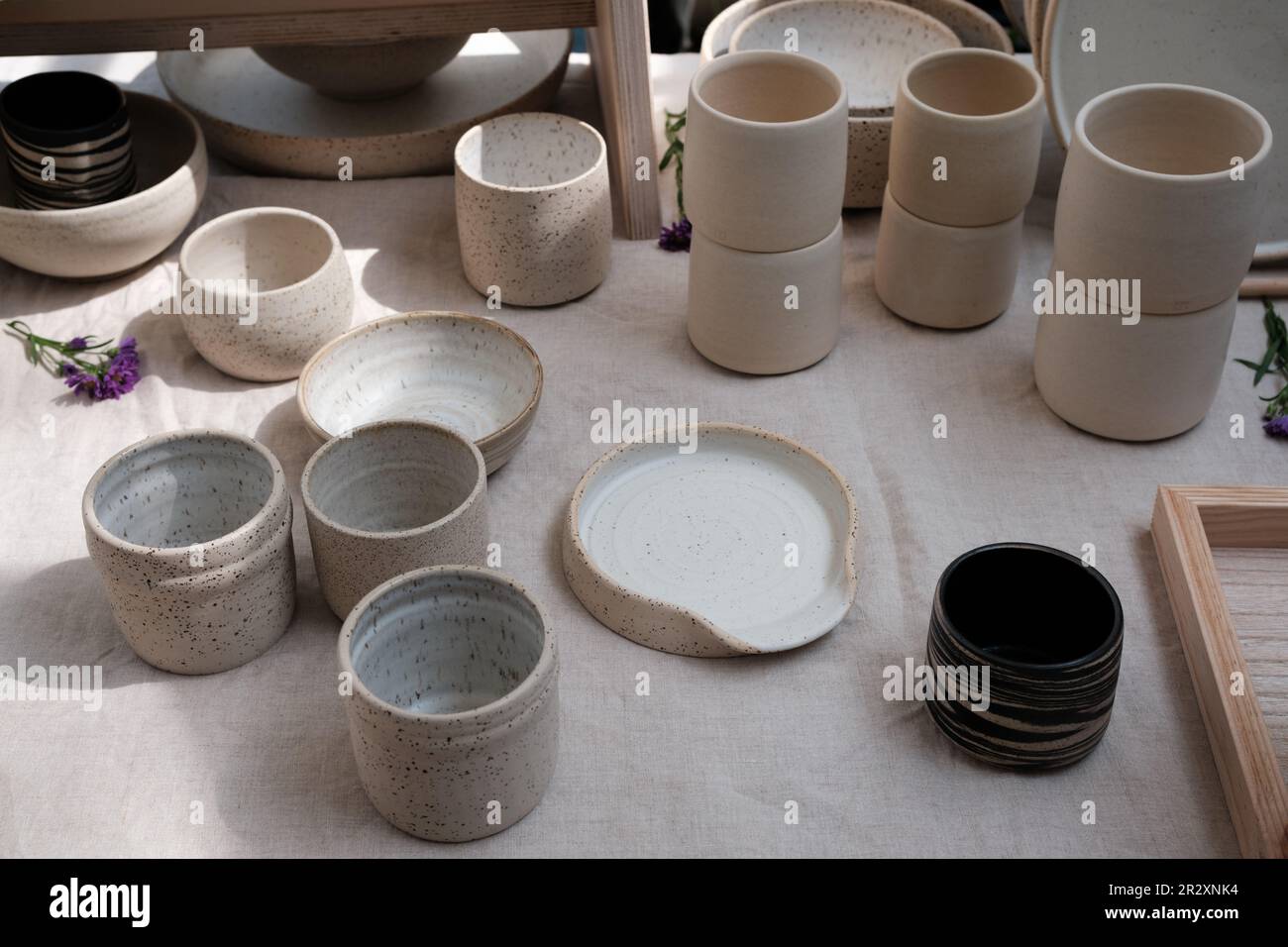 Beautiful handmade ceramics with neutral colours displayed at a small ...