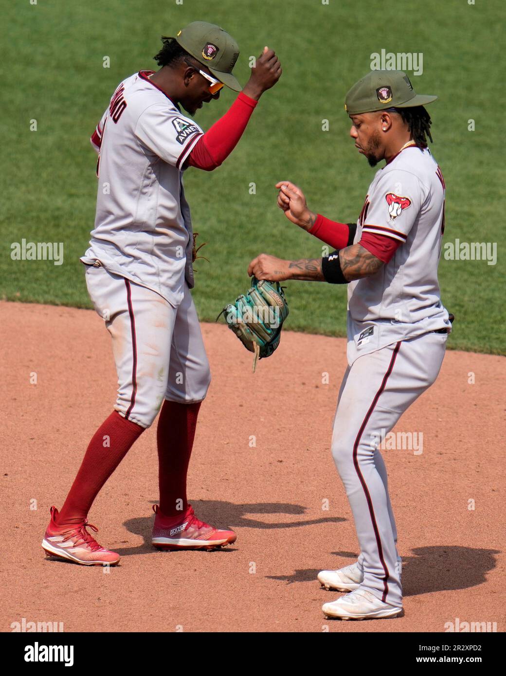 Arizona Diamondbacks' Geraldo Perdomo, left, and Ketel Marte celebrate ...