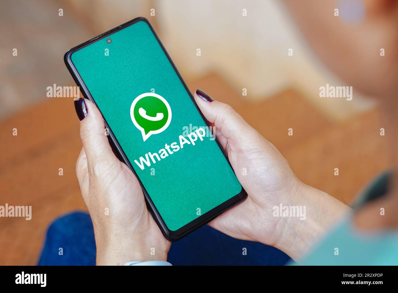 In this photo illustration, the WhatsApp logo is displayed on a ...