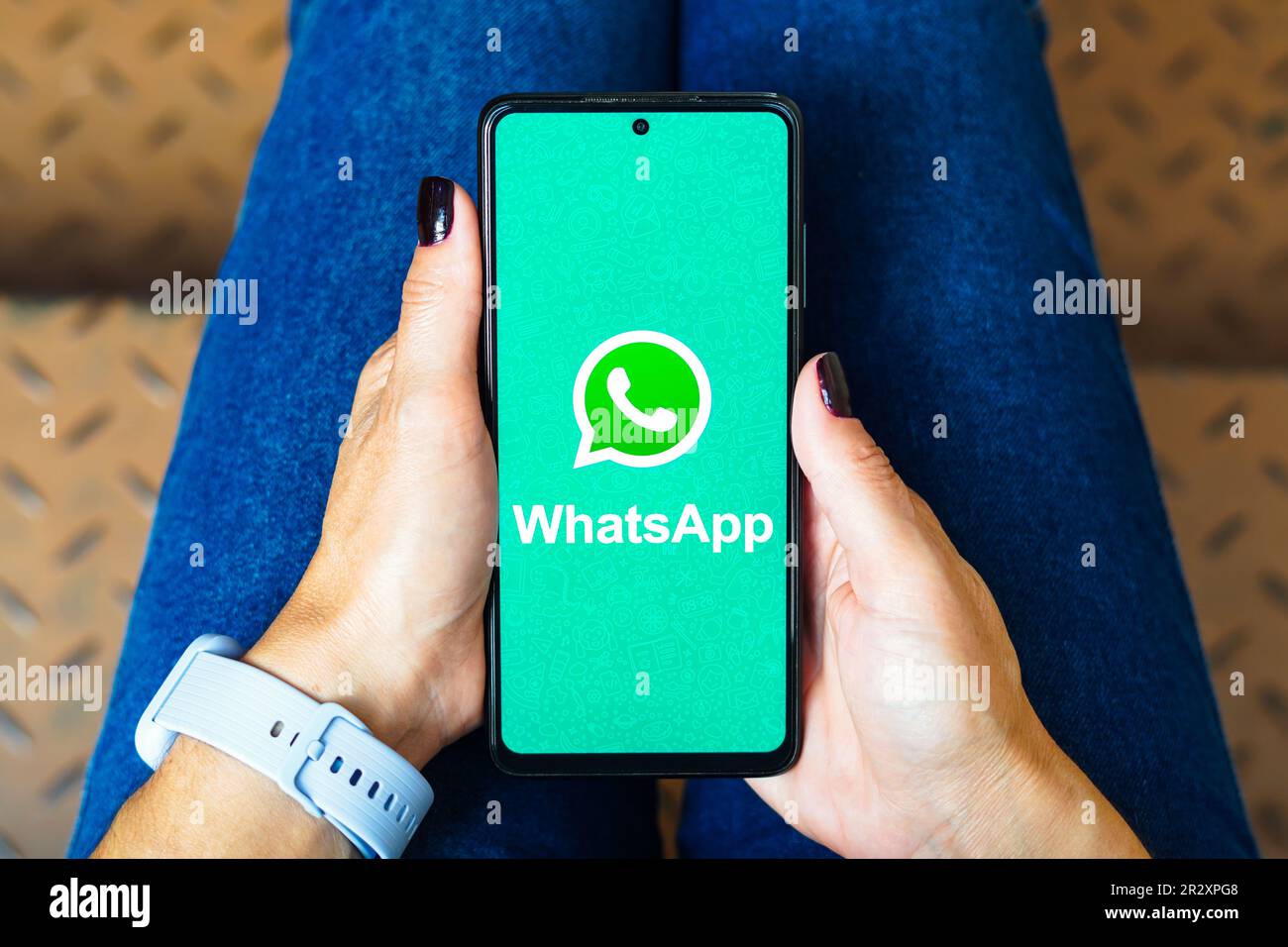 In this photo illustration, the WhatsApp logo is displayed on a ...