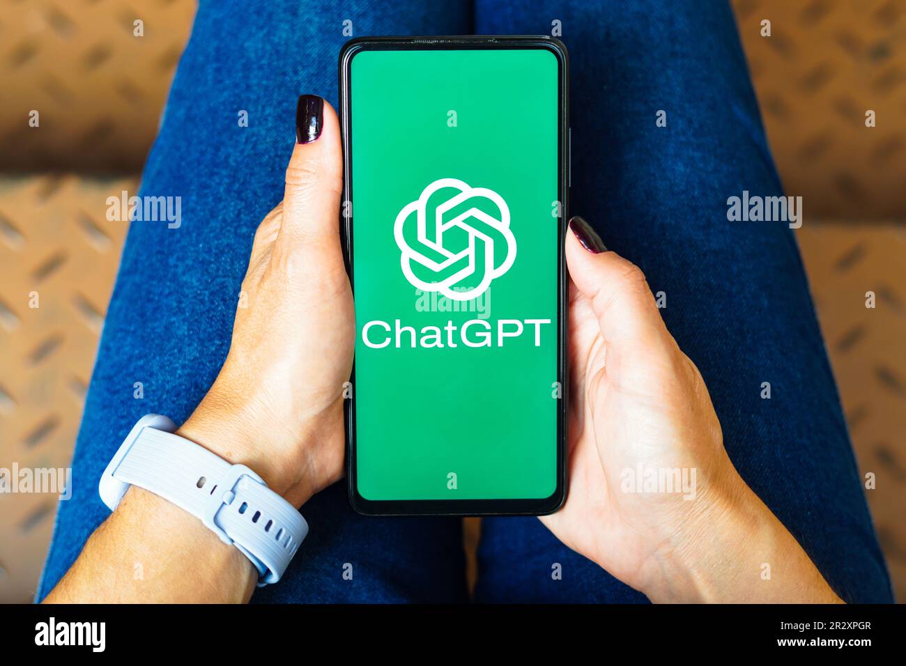 In this photo illustration, the ChatGPT logo is displayed on a ...