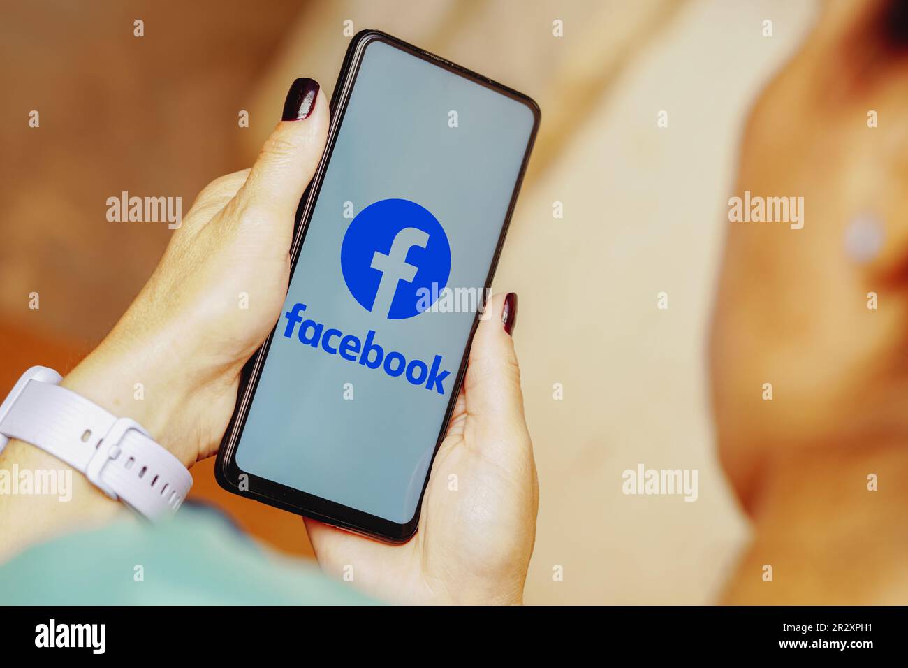 In this photo illustration, the Facebook logo is displayed on a ...