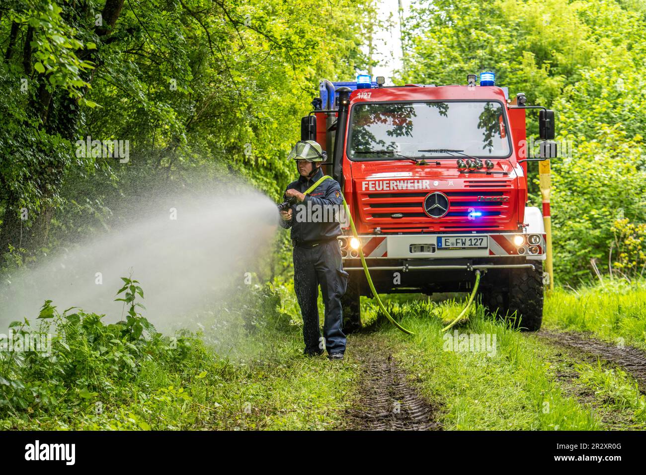 Forest fire fighting exercise of the Essen fire brigade, water supply ...