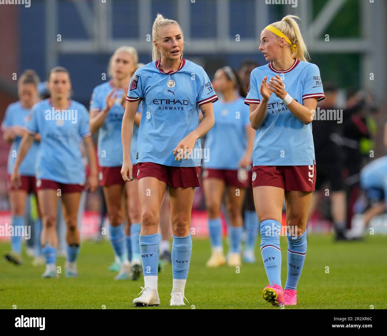 Alex Greenwood #5 speaks with Chloe Kelly #9 of Manchester City after ...