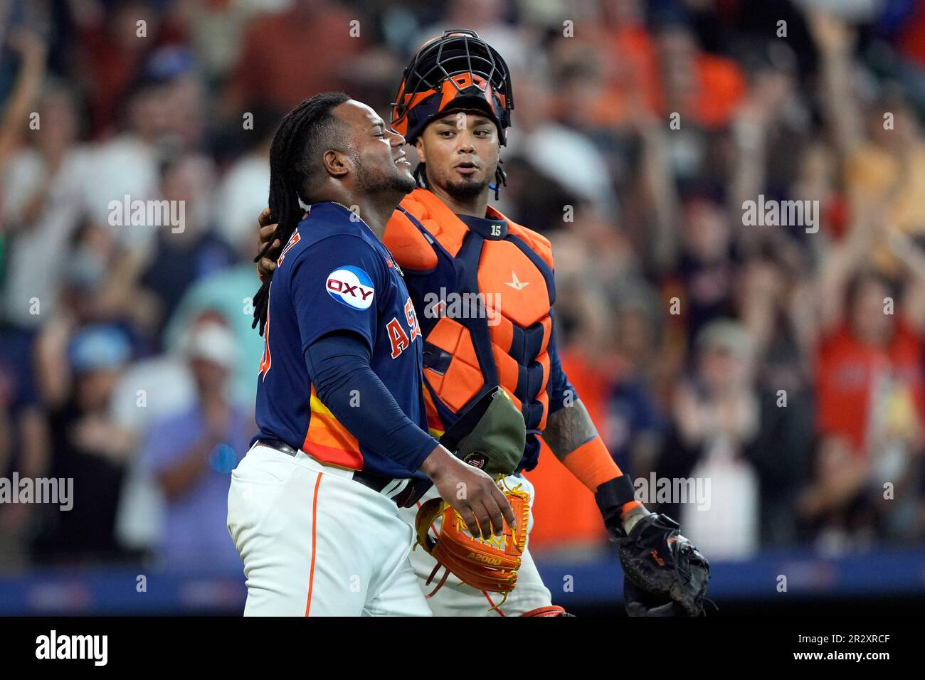 Houston Astros catcher Martin Maldonado, right, pulls the hair of ...
