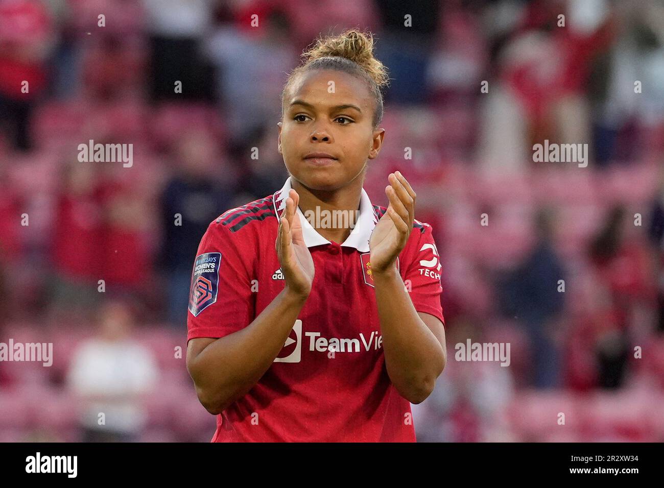 Nikita Parris #22 of Manchester United salutes the fans after the The ...