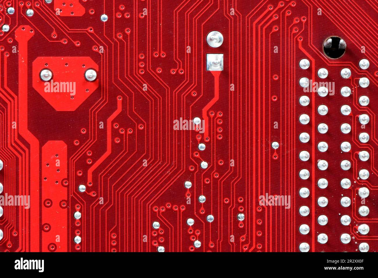 Closeup of a red printed circuit board Stock Photo - Alamy