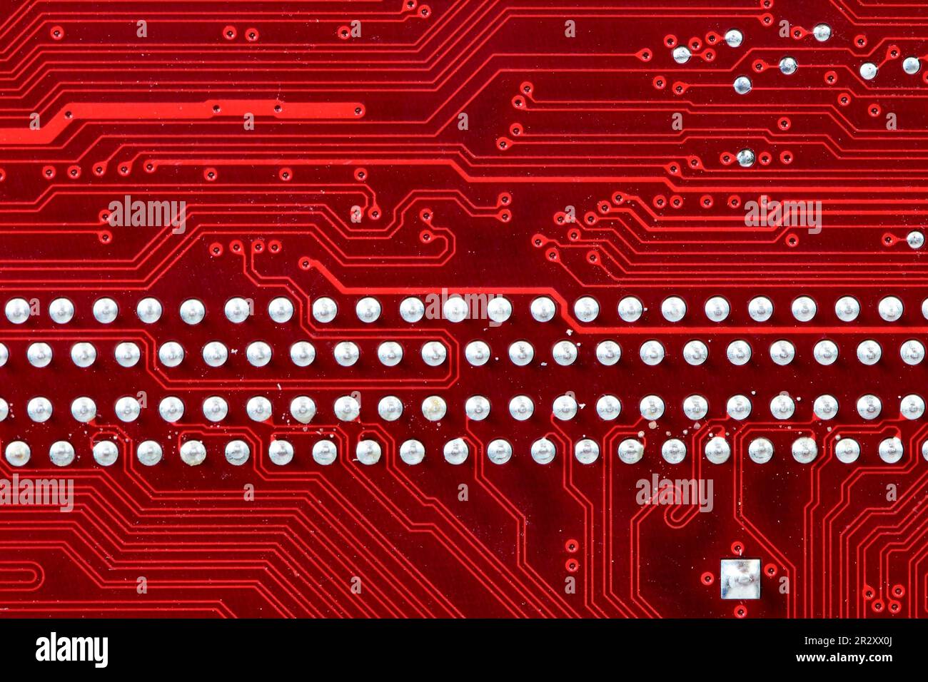 Closeup of a red printed circuit board Stock Photo - Alamy