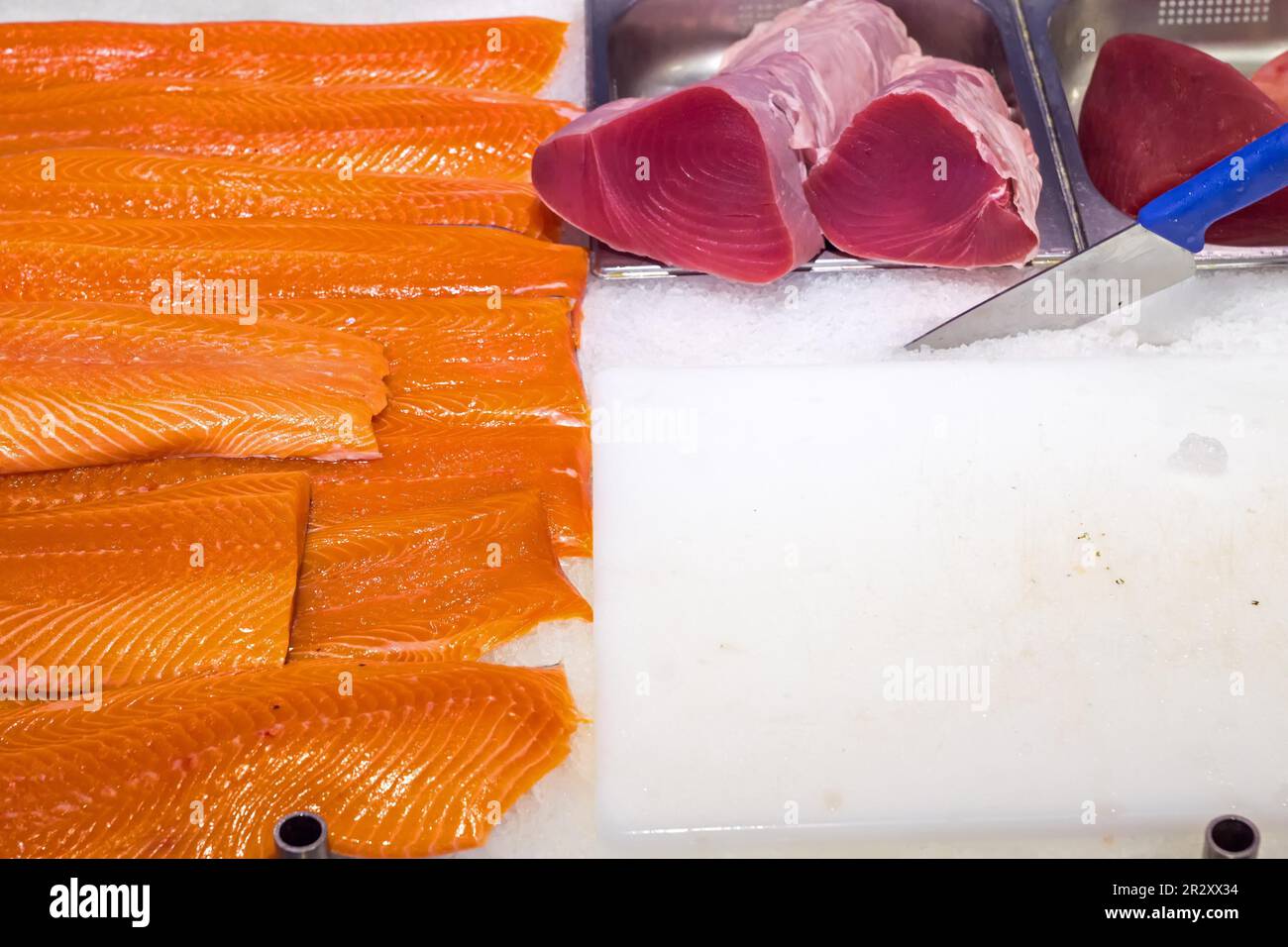 Fresh salmon and tuna fillets at the fish market Stock Photo - Alamy