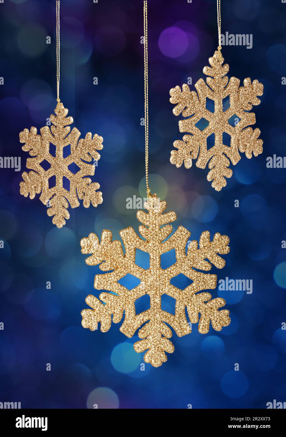 Christmas snowflake ornament on a holiday lights background Stock Photo ...