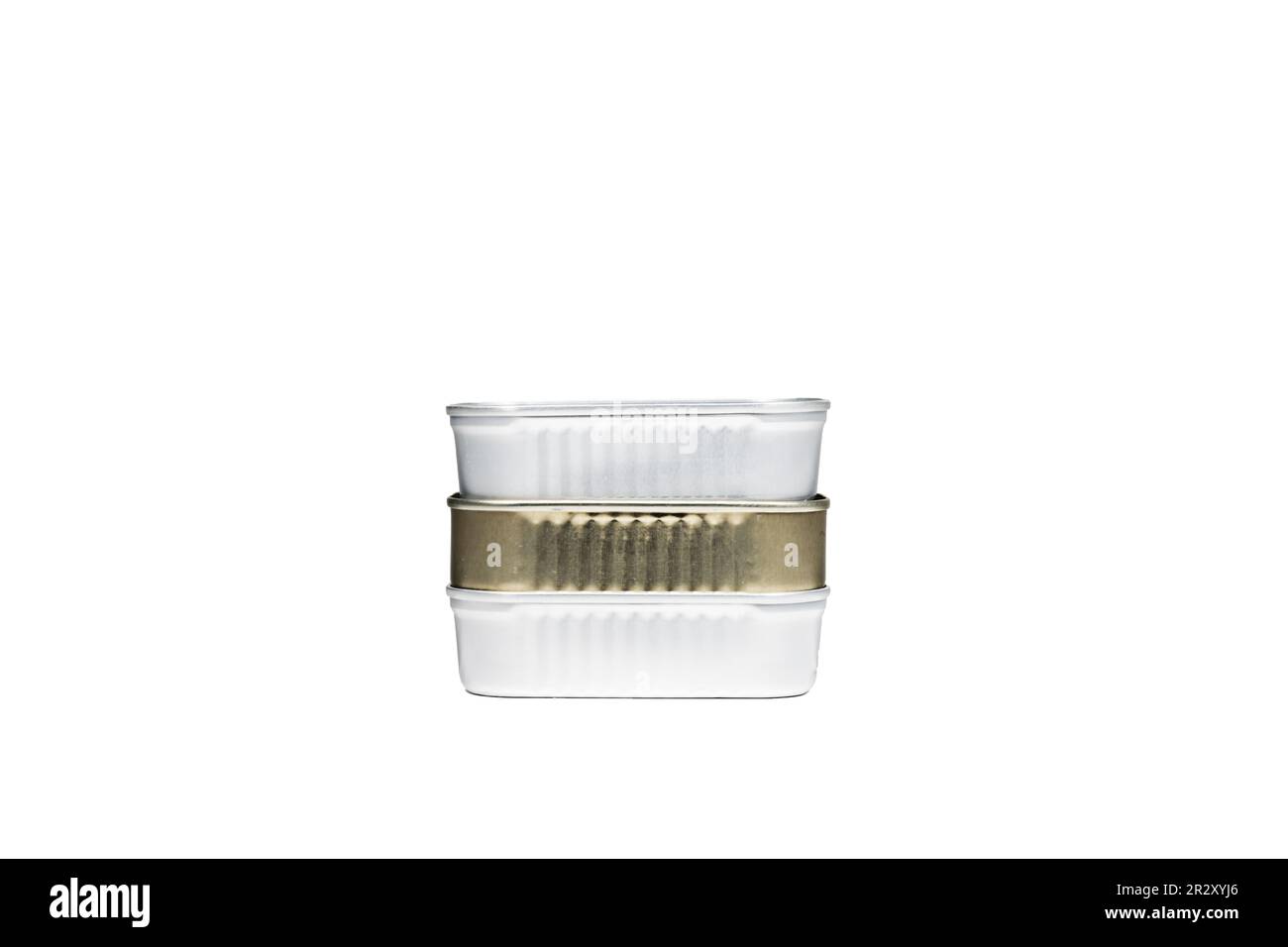 A column of various metal canning tins on a plain white background ...