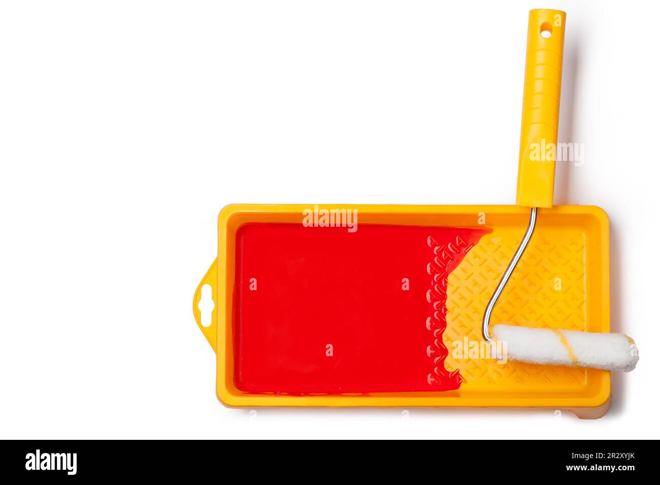 roller brush with red paint Stock Photo - Alamy