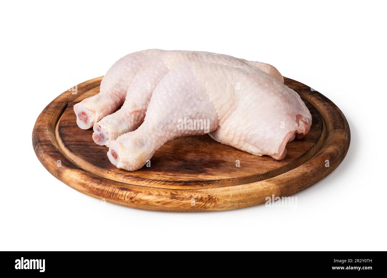 Pieces of raw chicken meat on a white background Stock Photo - Alamy