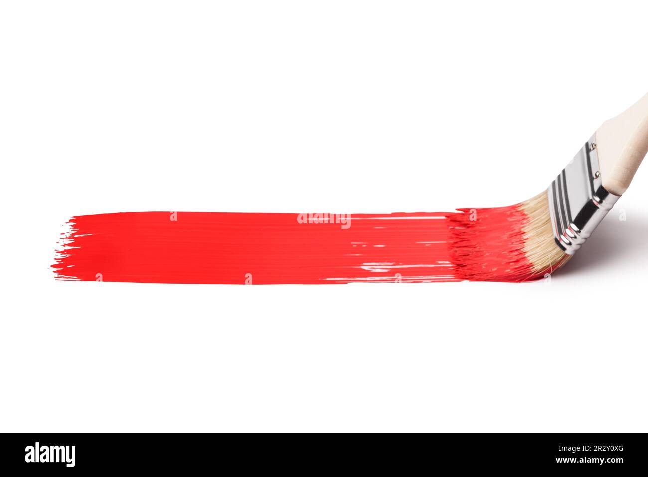 Paintbrush with red paint isolated over white background Stock Photo ...