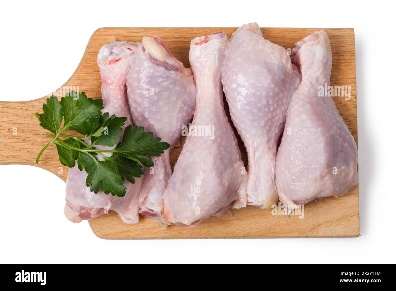 Pieces of raw chicken meat on a white background Stock Photo - Alamy