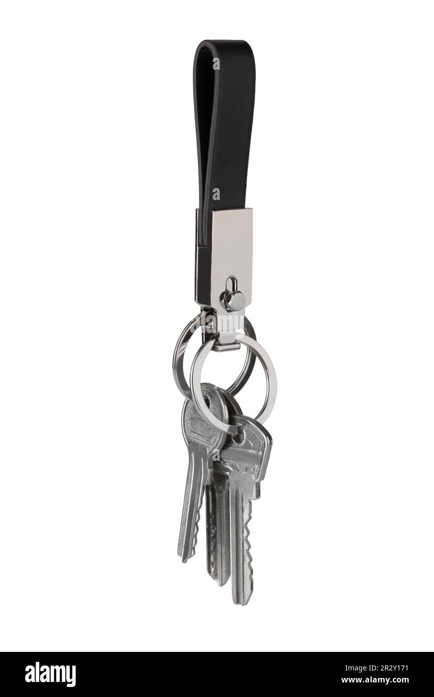 key attached to a leather keychain on a white Stock Photo - Alamy