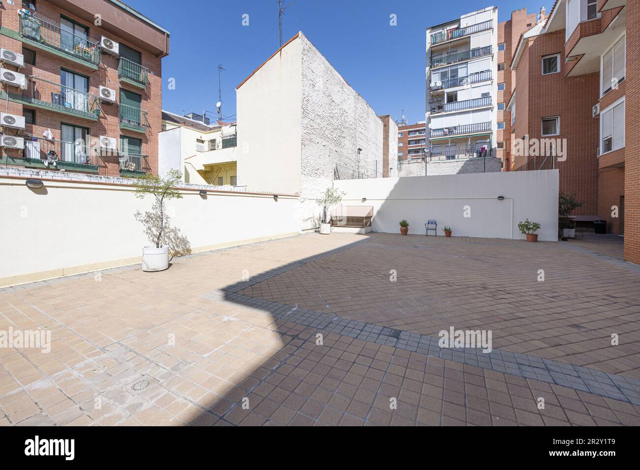 An interior patio dedicated to common areas of a residential urban ...