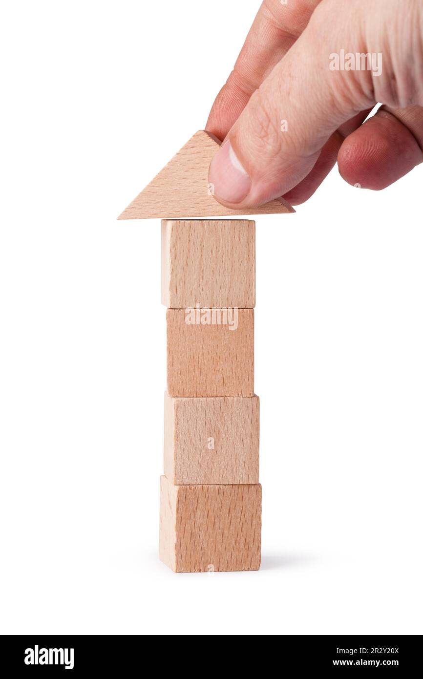 wood bricks tower Children's toys - wooden cubes on a white background ...