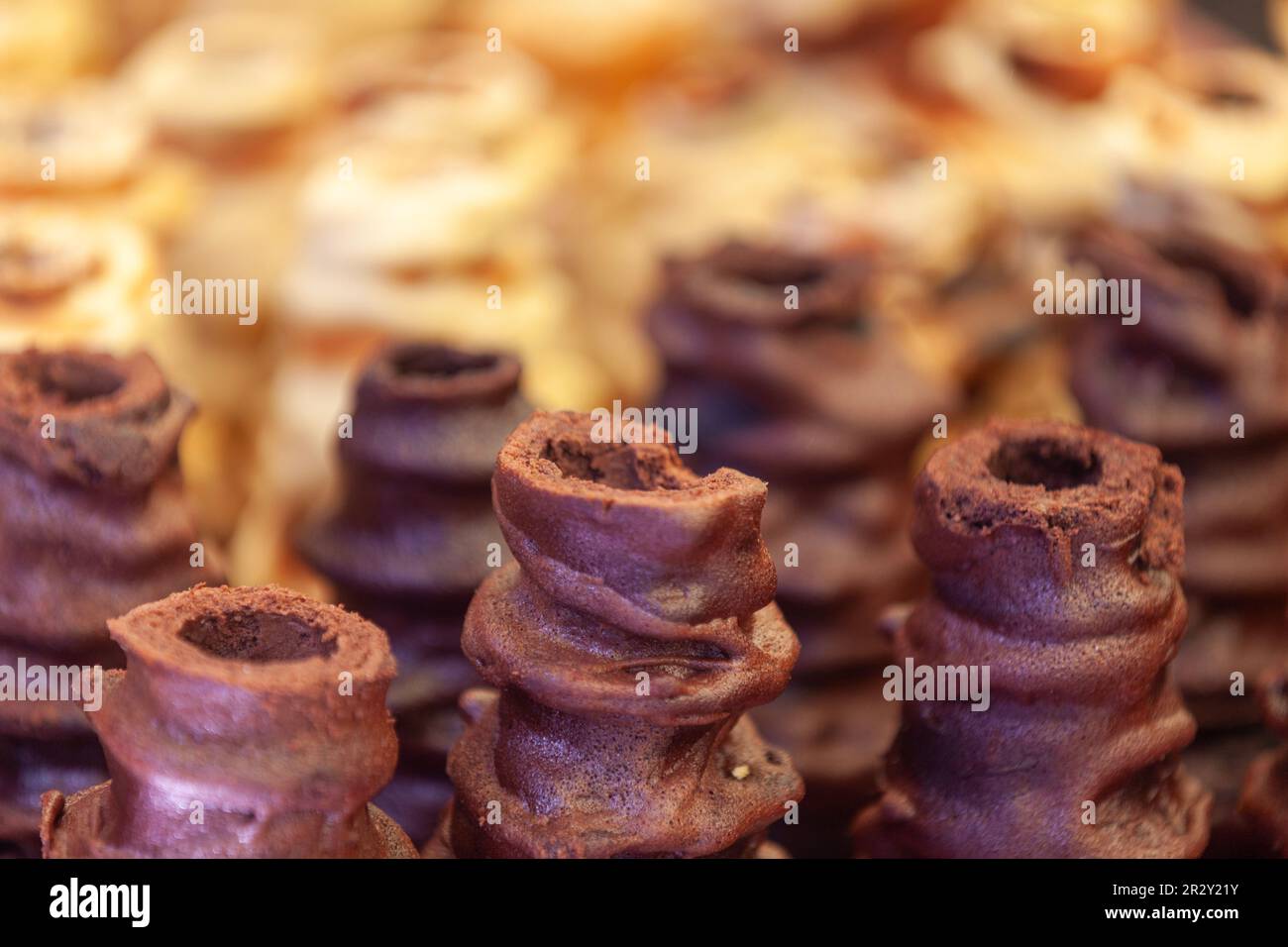 A French spit cake consisting of layers of batter placed, one at a time ...