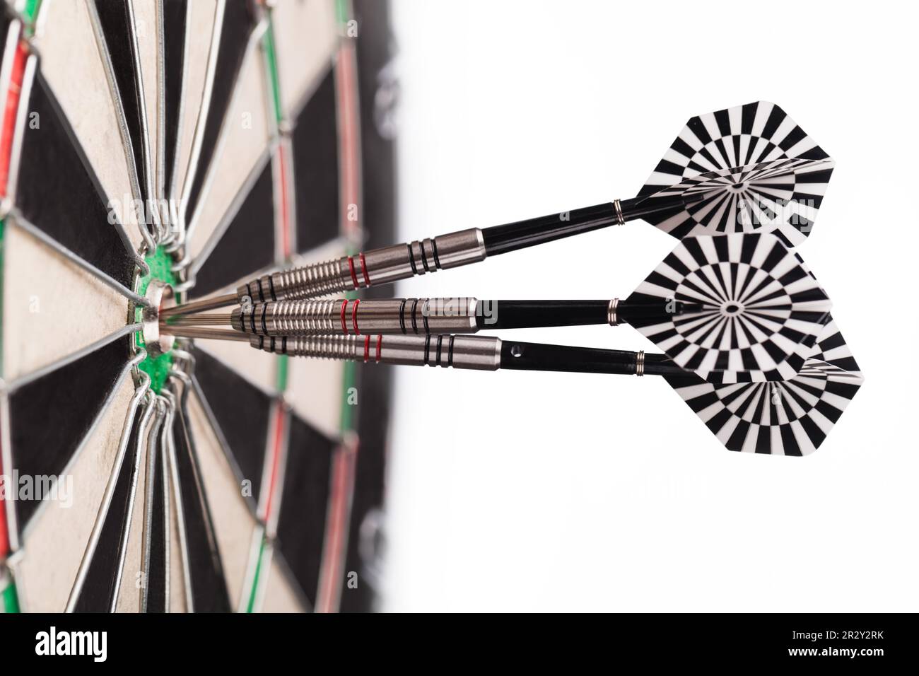 darts arrows in the target Stock Photo - Alamy