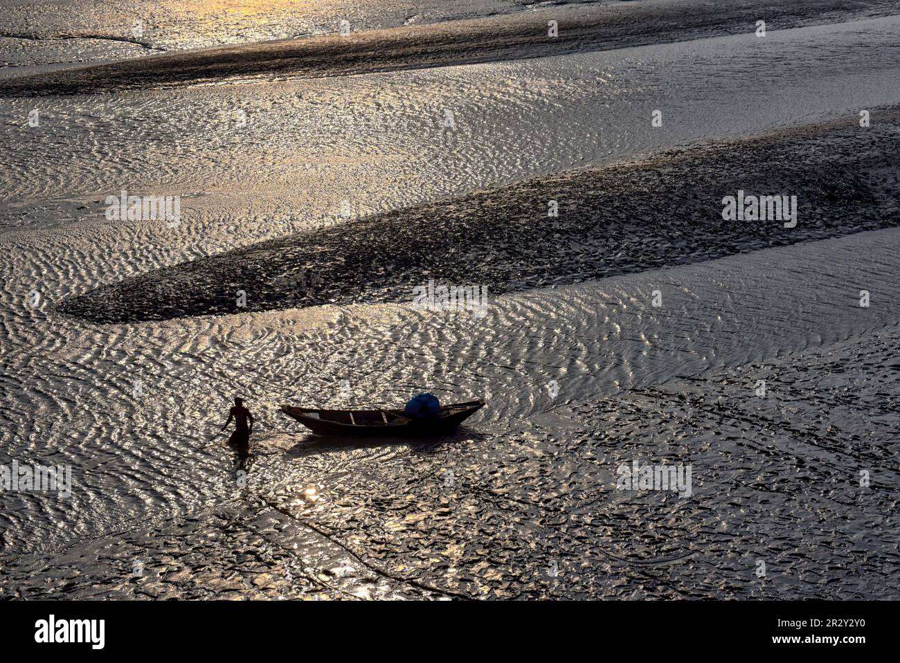 Canning, India. 21st May, 2023. A fisherman seen in the middle of river ...