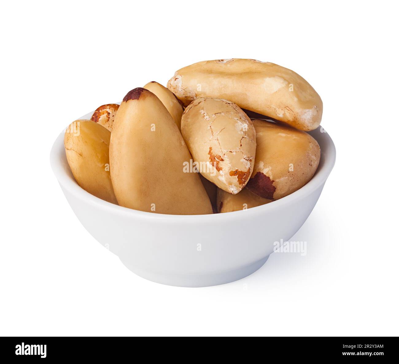 Brazil nuts on a white background Stock Photo - Alamy