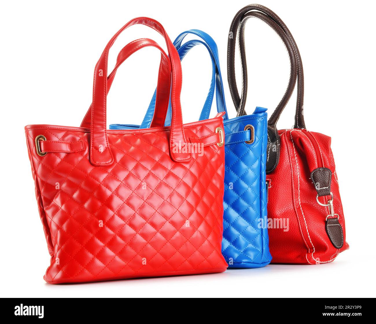 Three leather handbags isolated on white background Stock Photo - Alamy