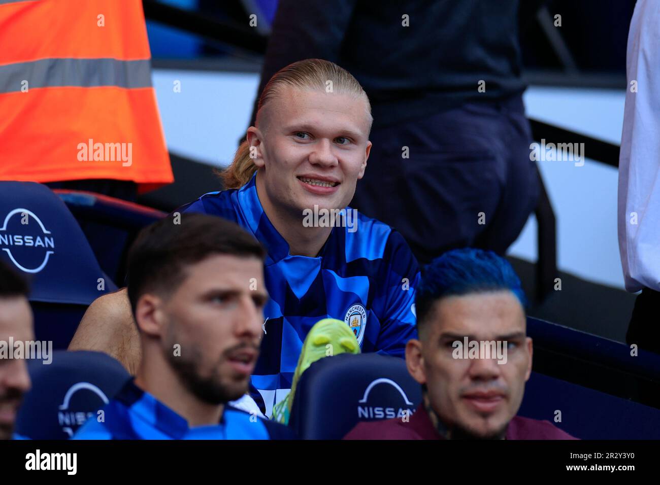 Erling Haaland #9 of Manchester City on the substitutes bench ahead of ...