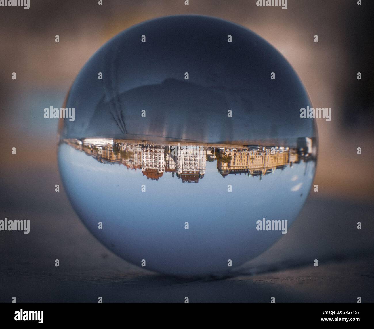 View of buildings seen through a crystal ball Stock Photo - Alamy